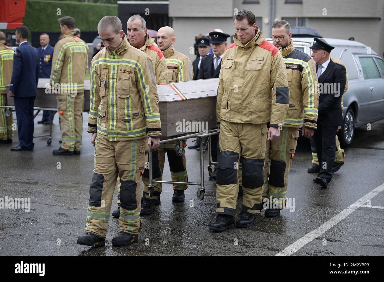 Illustration picture shows colleagues carrying the coffin of a deceased ...