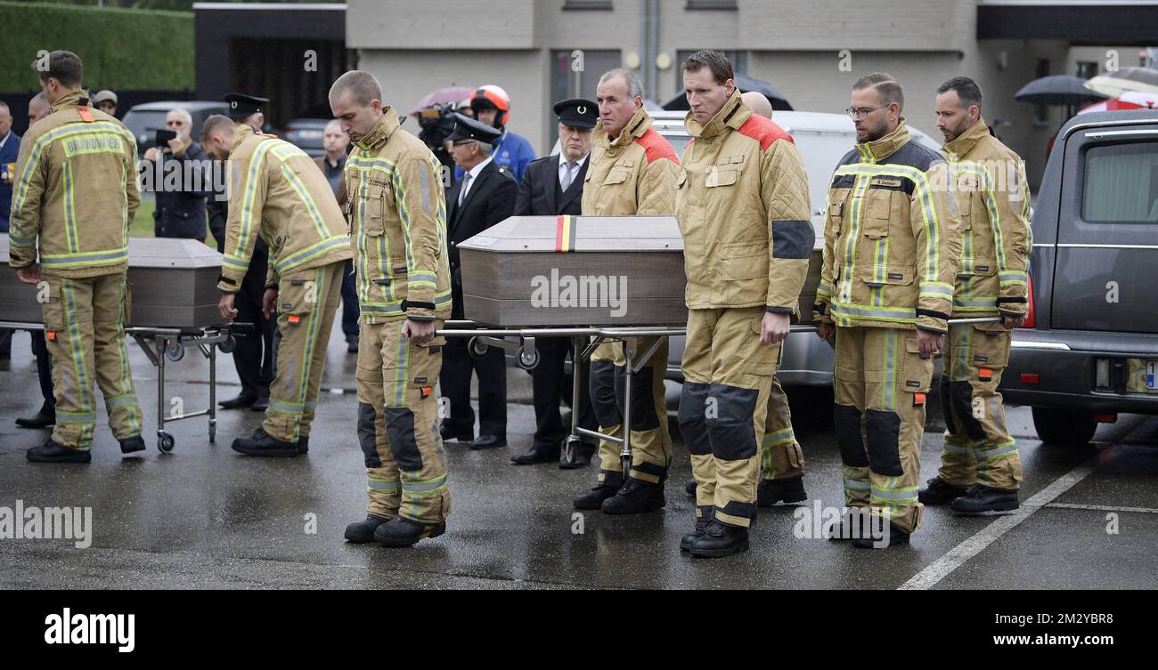 Illustration picture shows colleagues carrying the coffin of a deceased ...