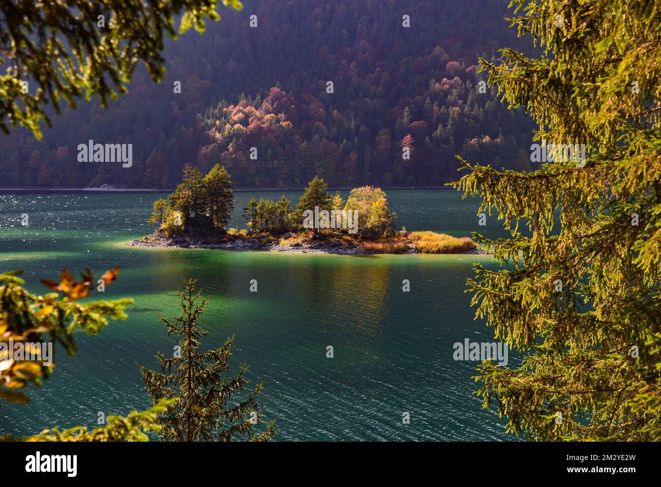 Island in the Eibsee lake near Grainau, below the Zugspitze in the ...