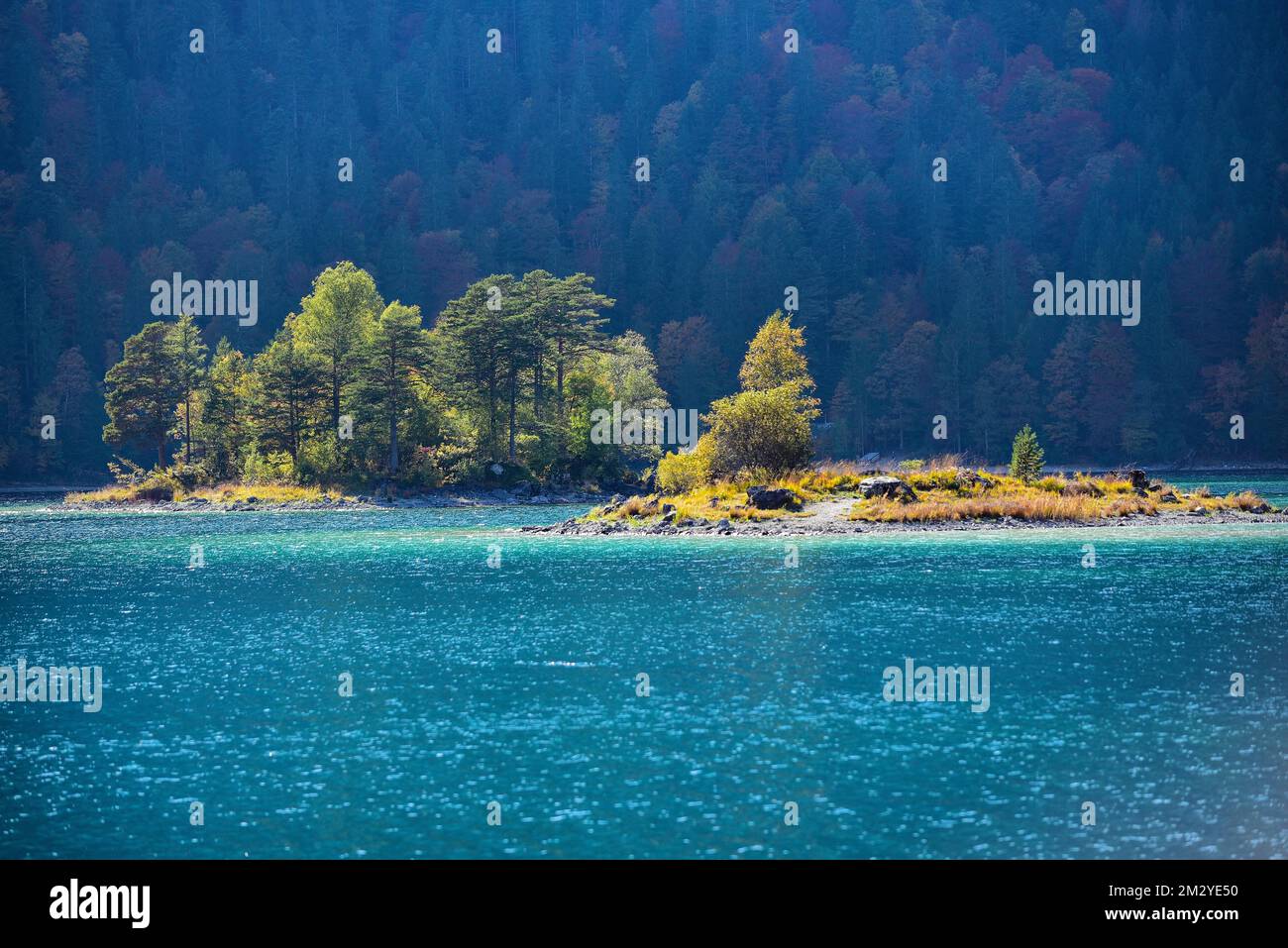 Island in the Eibsee lake near Grainau, below the Zugspitze in the ...