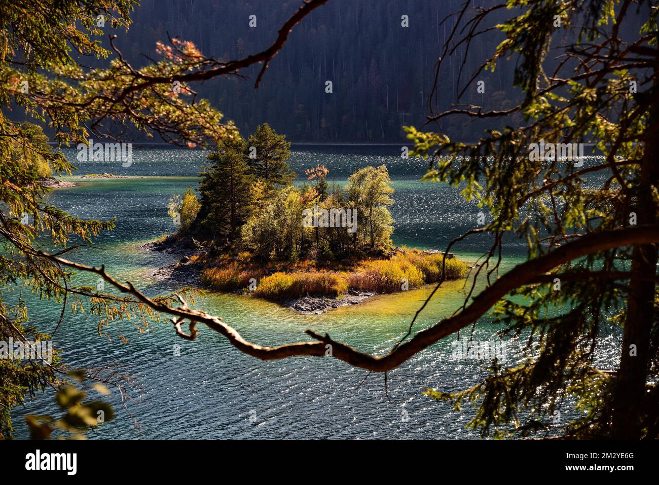 Island in the Eibsee lake near Grainau, below the Zugspitze in the ...