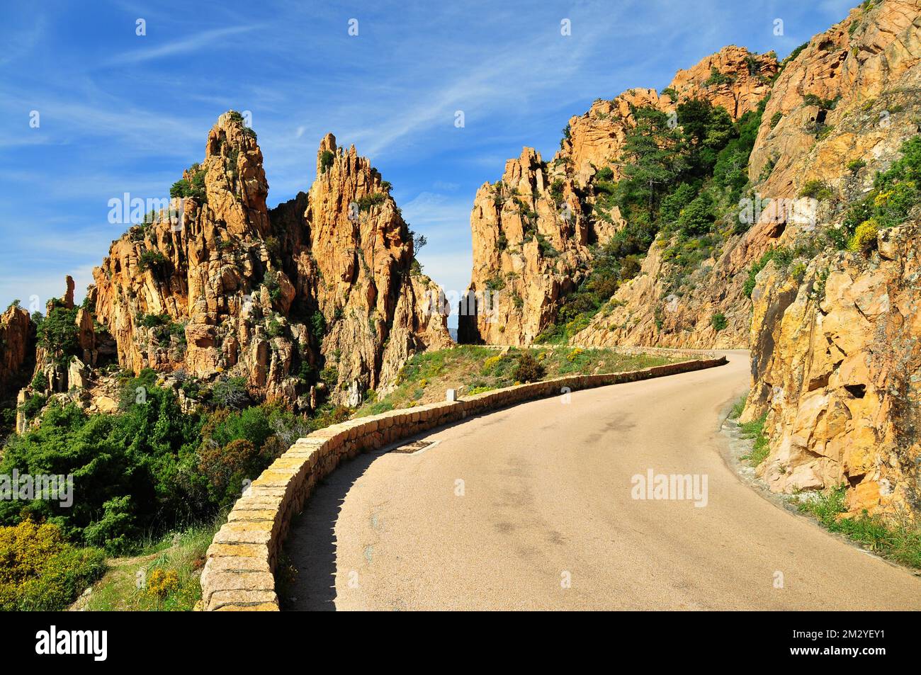 Granite rock formation on the coastal road through the Calanche de ...