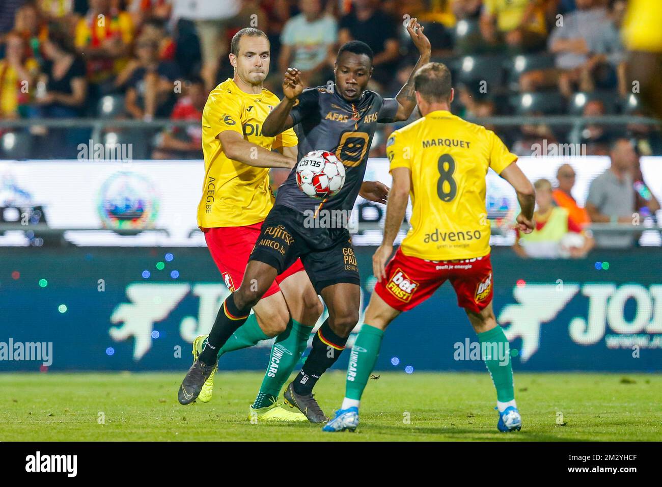 Oostende's Goran Milovic and Mechelen's William Togui fight for the ...