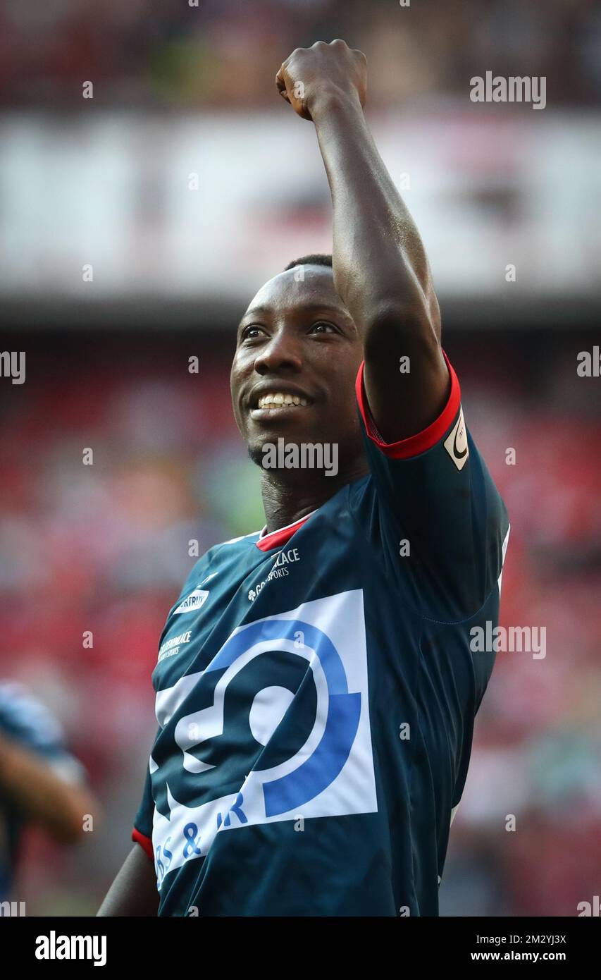 Kortrijk's Eric Ocansey celebrates after scoring during a soccer match ...