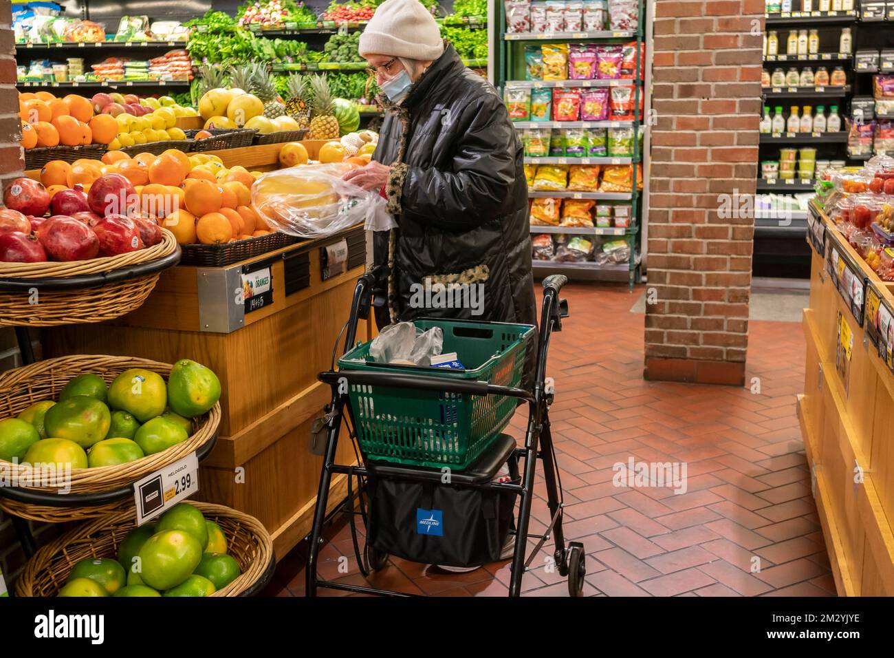 Senior citizen shopping at a supermarket in New York on Tuesday ...
