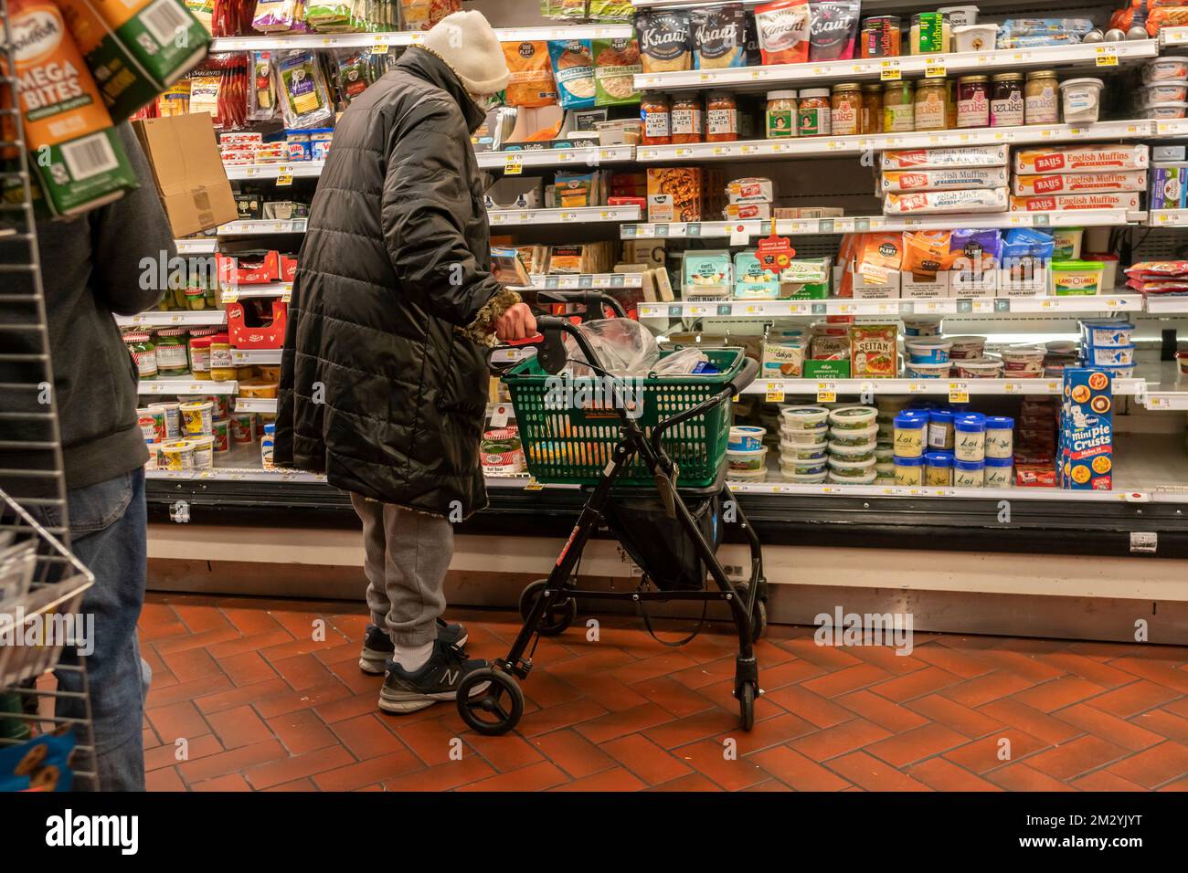 Senior citizen shopping at a supermarket in New York on Tuesday ...