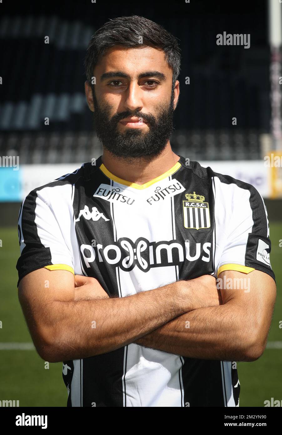 Charleroi's Kaveh Rezaei poses for the photographer after a press ...
