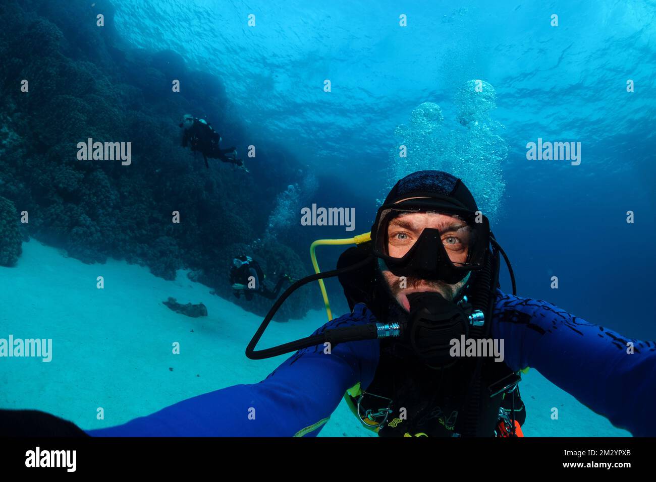 An Underwater selfie of a happy Scuba diver during his dive in Egypt ...