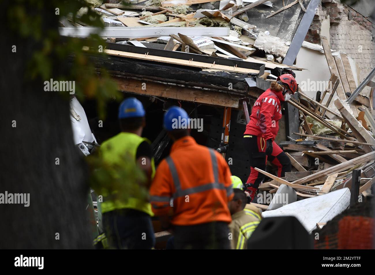 Fire fighters and rescue workers pictured at the site of an explosion ...