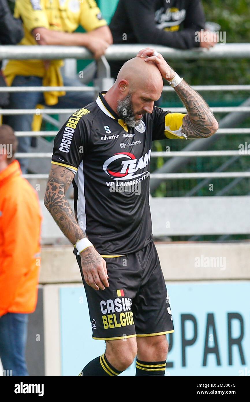 Lokeren's Jelle Van Damme looks dejected during a soccer match between ...