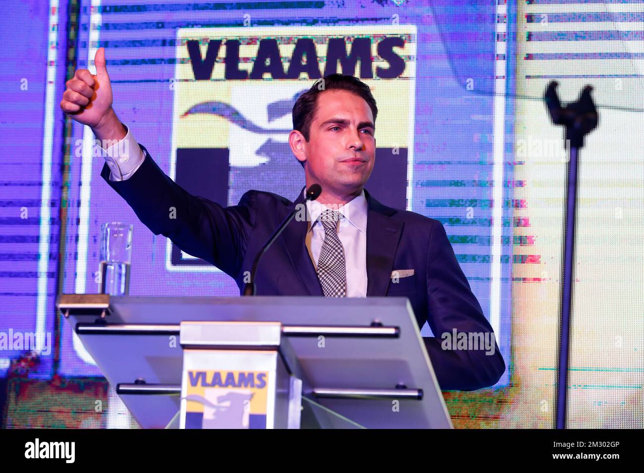 Vlaams Belang's Tom Van Grieken delivers a speech at a national fight ...