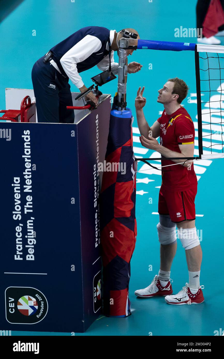 Belgium's Sam Deroo talks to a referee during a group B game between ...