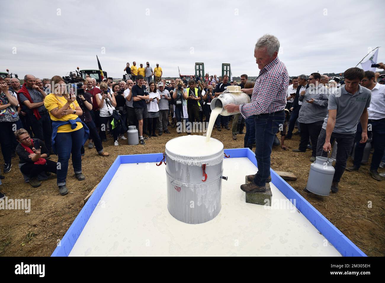 Illustration shows a protest action and commemoration of the 2009 milk ...