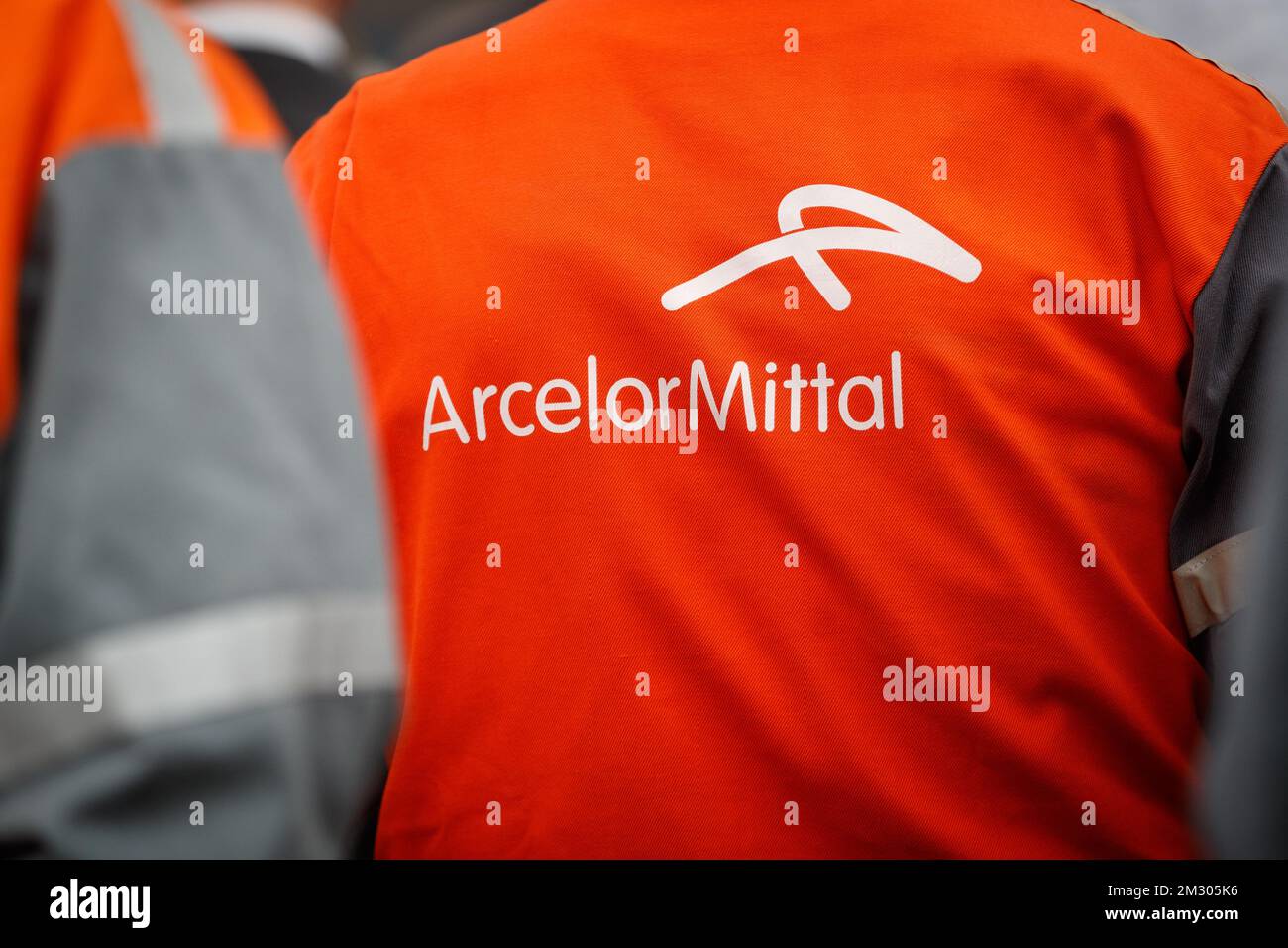 Illustration picture shows the ArcelorMittal logo on a vest at the ...
