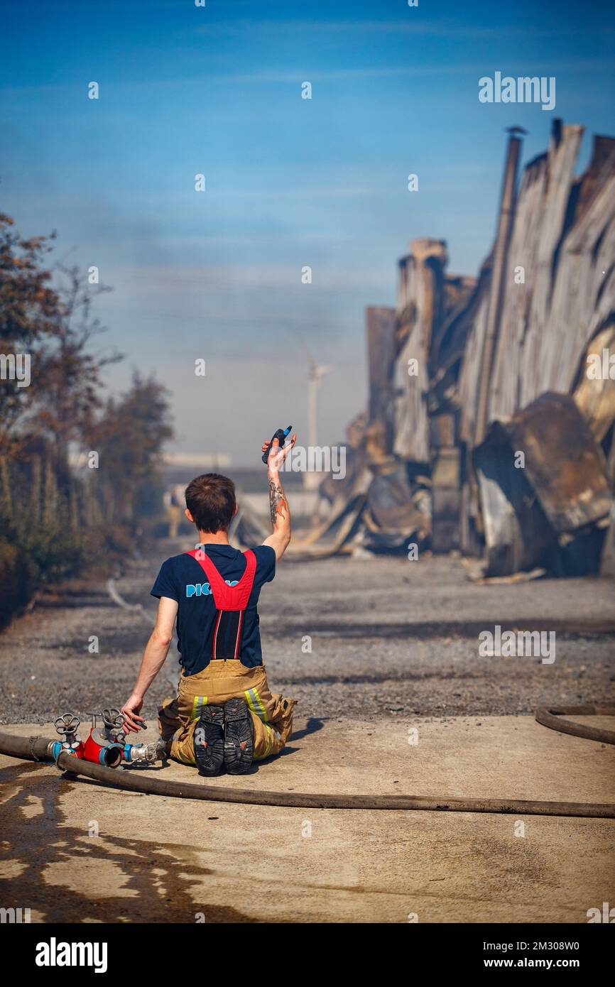 Illustration picture shows a fireman on the scene of a fire in the ...