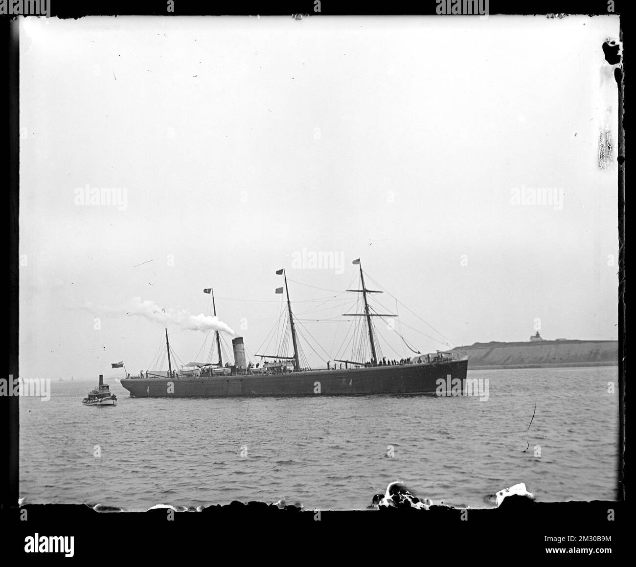 Four masted ship and tugboat in harbor , Ships. Hingham Public Library ...