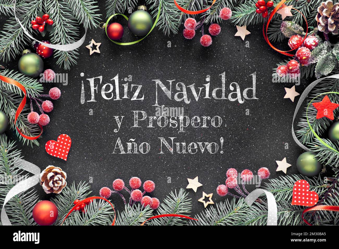 Christmas frame with fir twigs, trinkets in red and green, stars ...