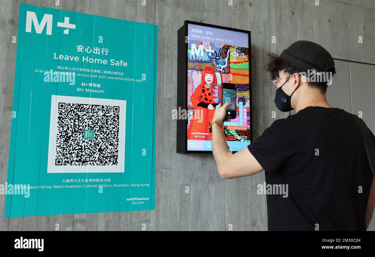 A man scan the QR code of HHeave Home SafeHHmobile app outside M+ in ...