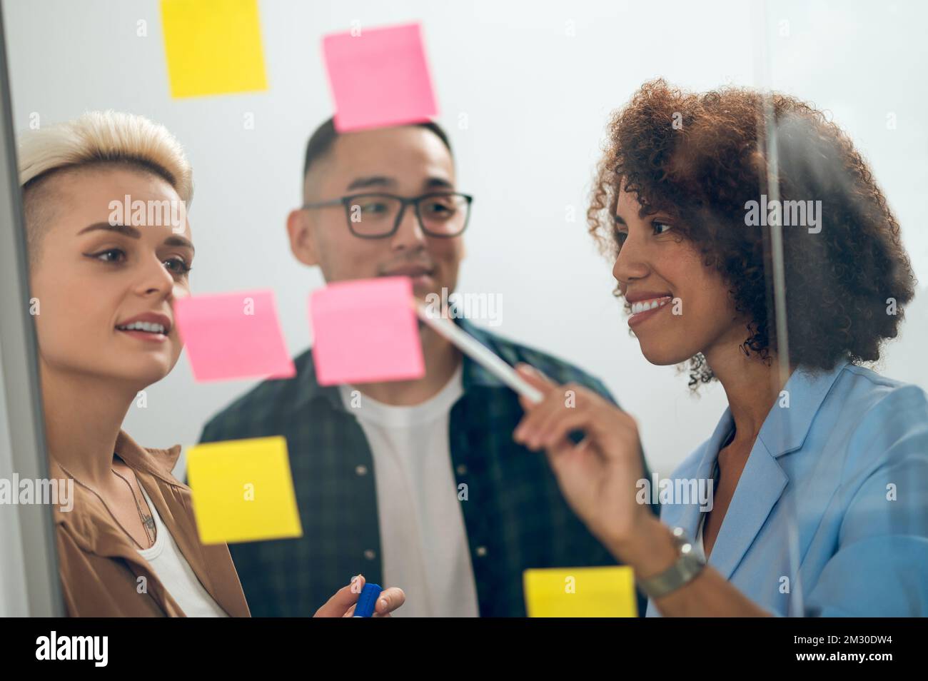 Female colleagues sharing ideas hi-res stock photography and images - Alamy