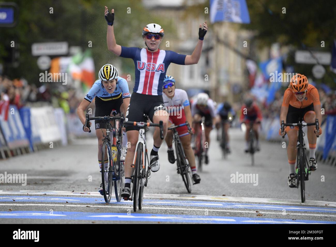 American Megan Jastrab celebrates as she crosses the finish line to win ...