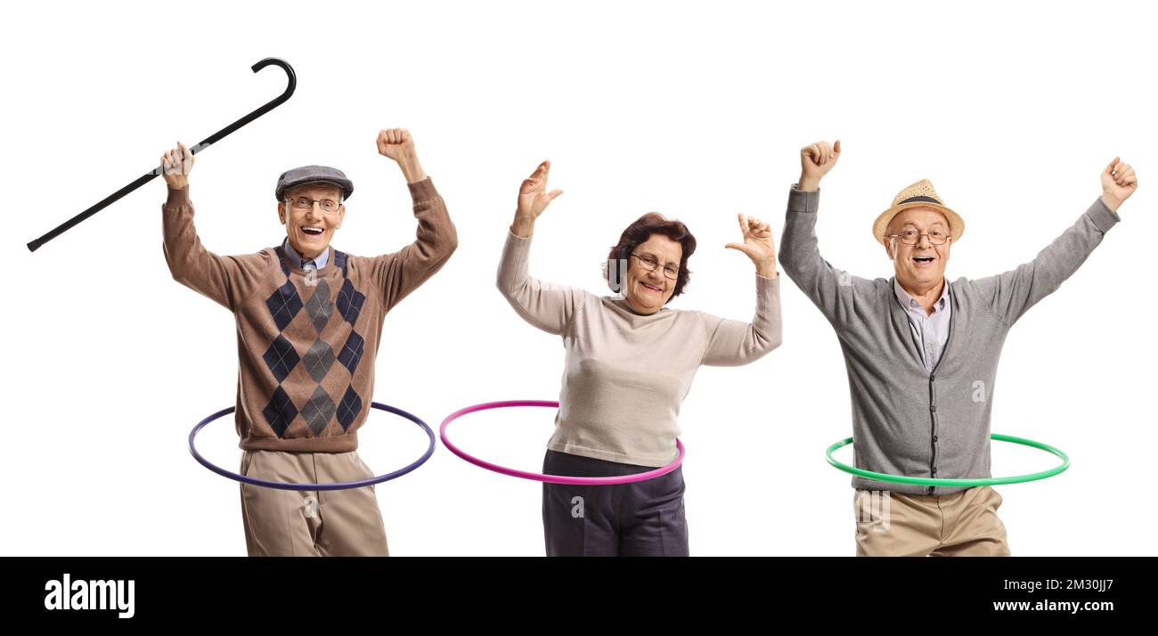 Happy senior people spinning hula hoops isolated on white background ...