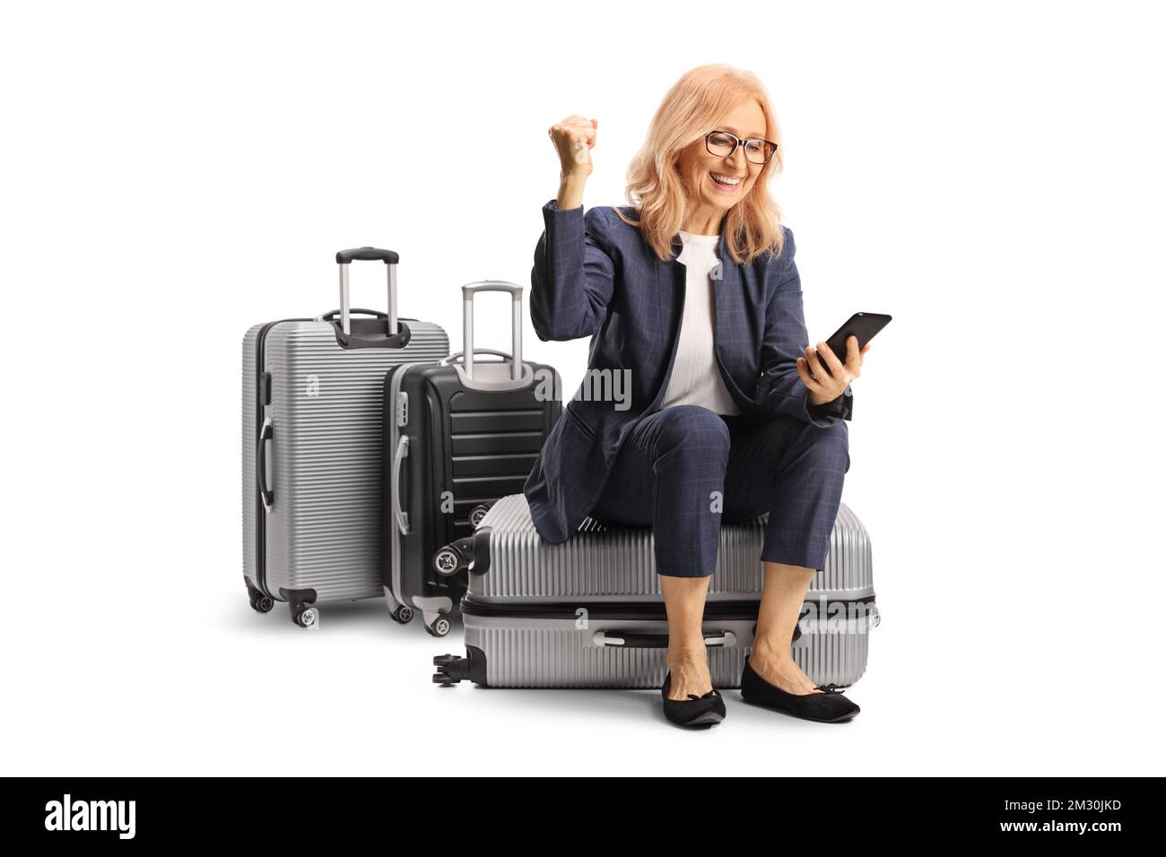 Mature woman packing holiday bag hi-res stock photography and images ...