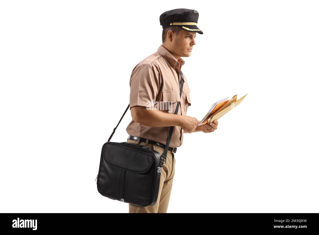 Profile shot of a mailman with a bag delivering letters isolated on ...