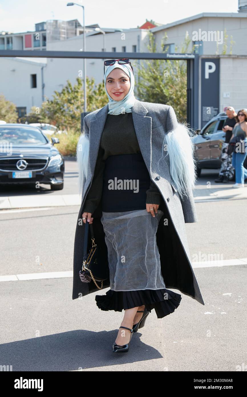 MILAN, ITALY - SEPTEMBER 22, 2022: Aya Mohamed before Prada fashion ...