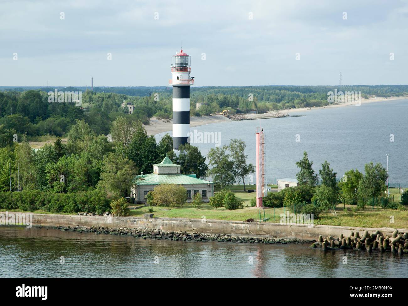 The view of 37 meters high Daugavgriva Lighthouse in Riga at the ...