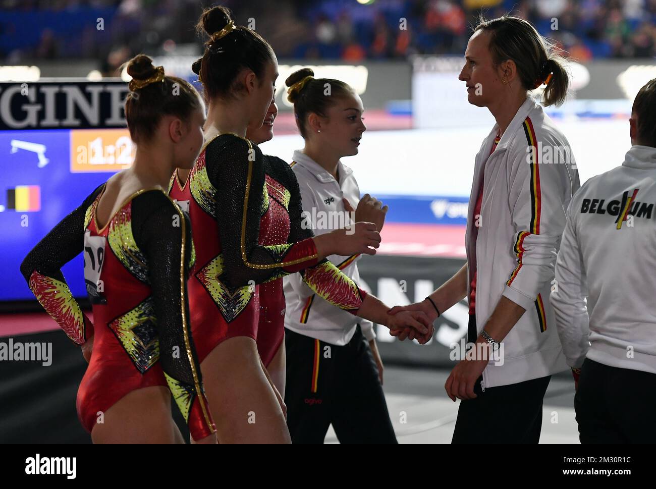 Belgian gymnastic coach Marjorie Heuls reacts during day one of the ...