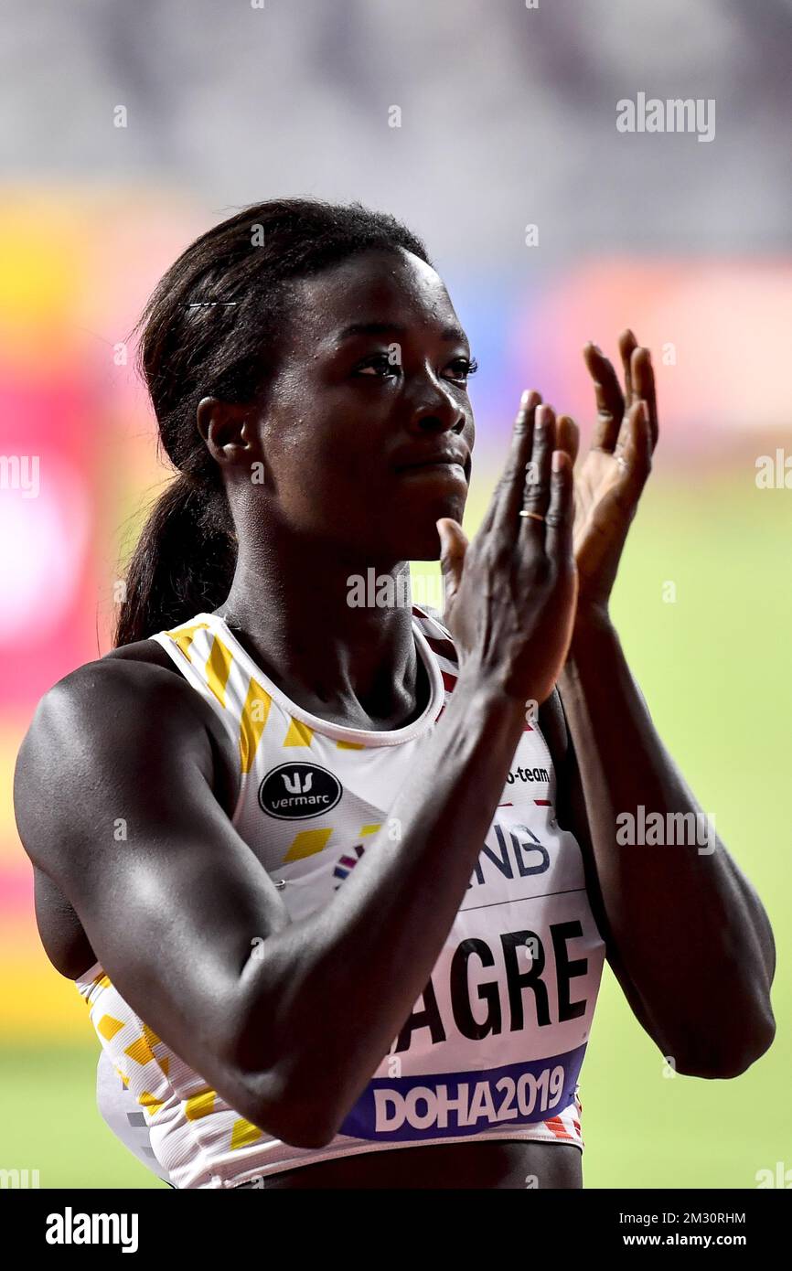 Anne Zagre reacts after the heats of the women's 100m hurdles ...