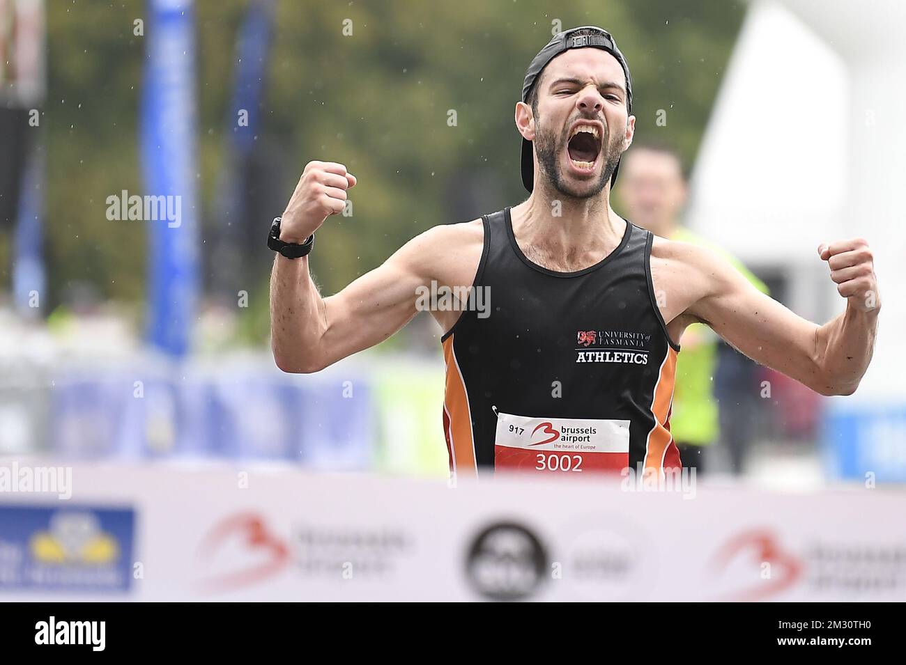 Britain's Nick Earl celebrates as he crosses the finish line of the ...