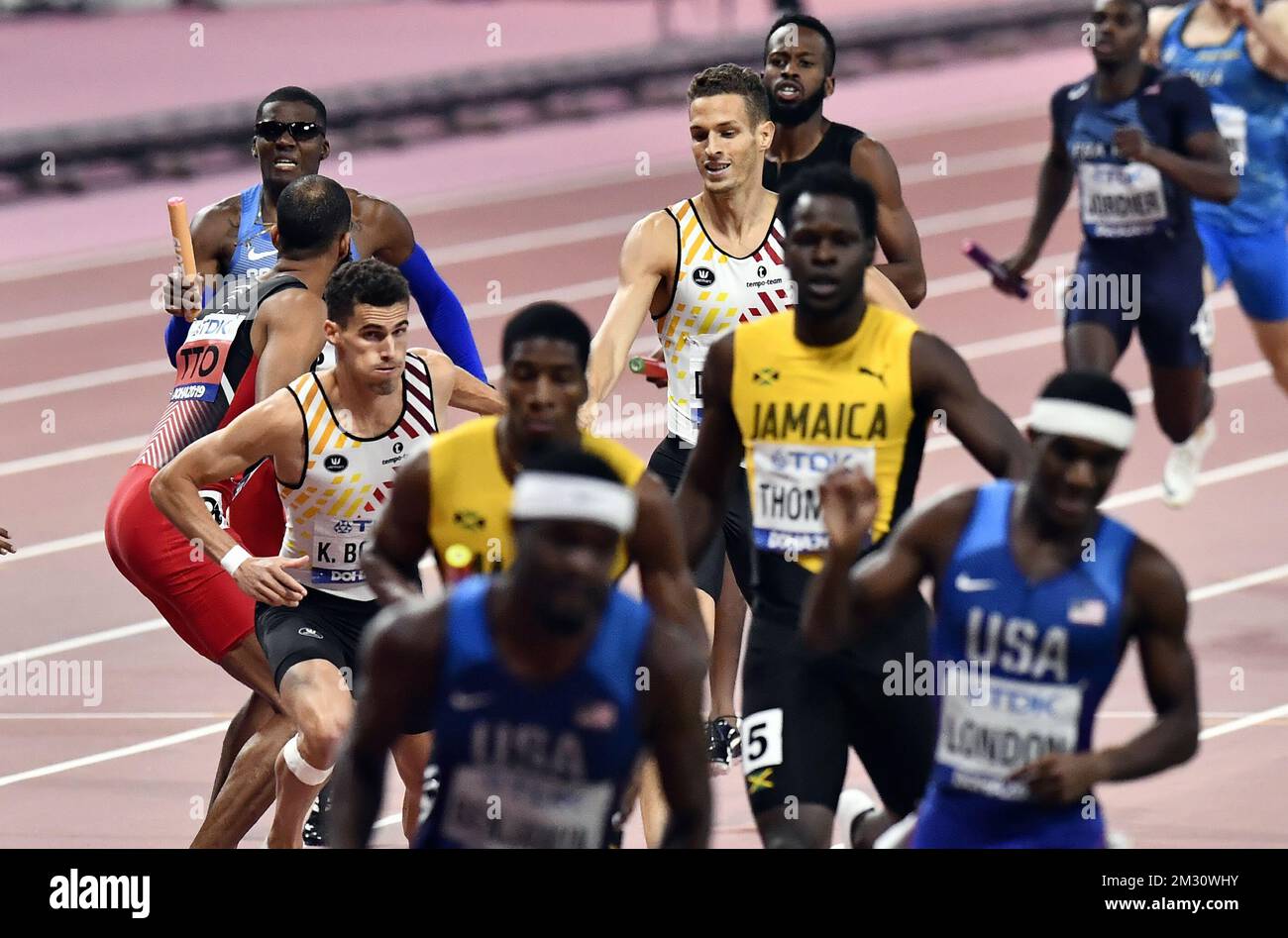Belgian Kevin Borlee runs after receiving the relay baton from his ...