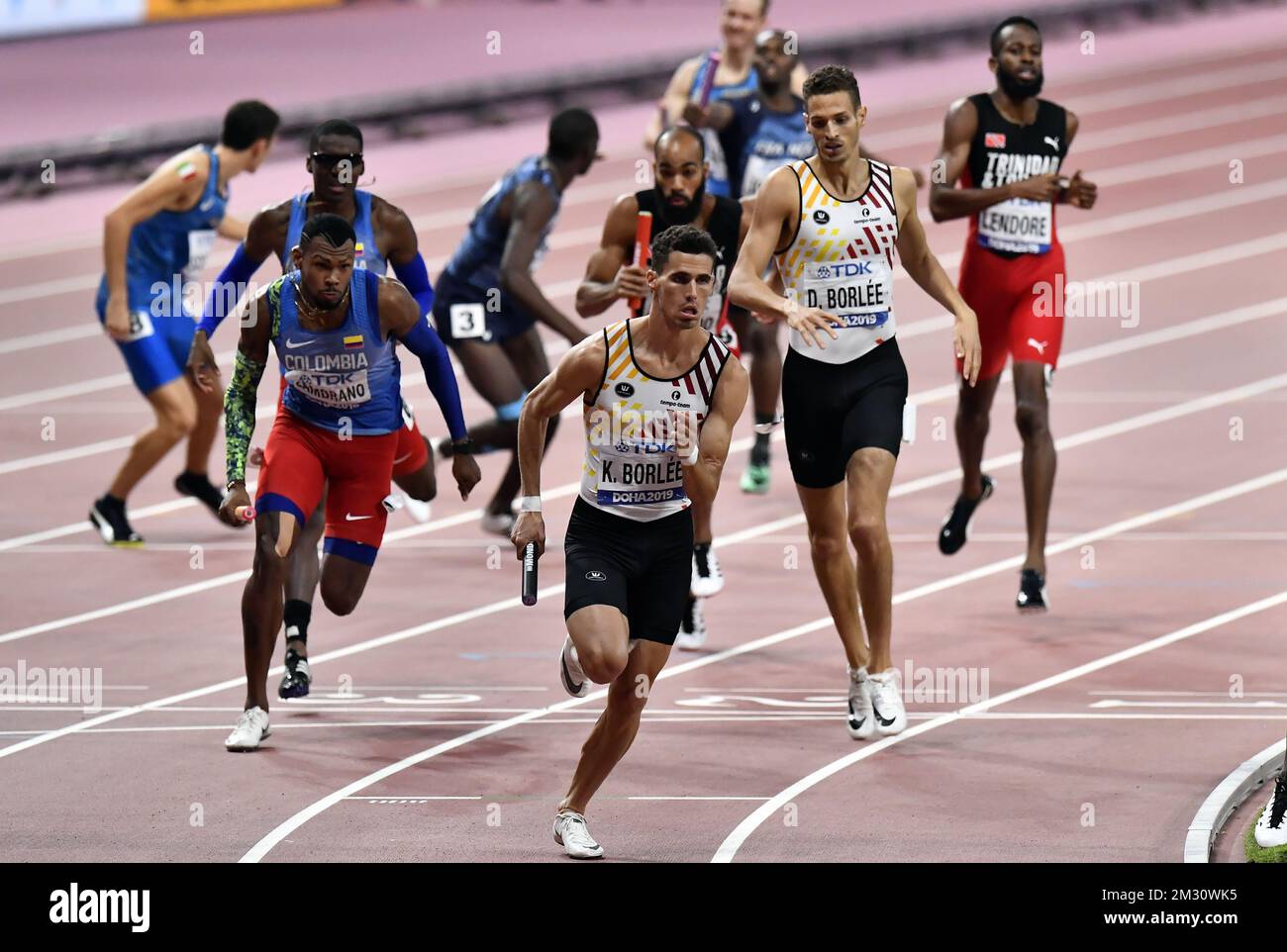 Belgian Kevin Borlee runs after receiving the relay baton from his ...