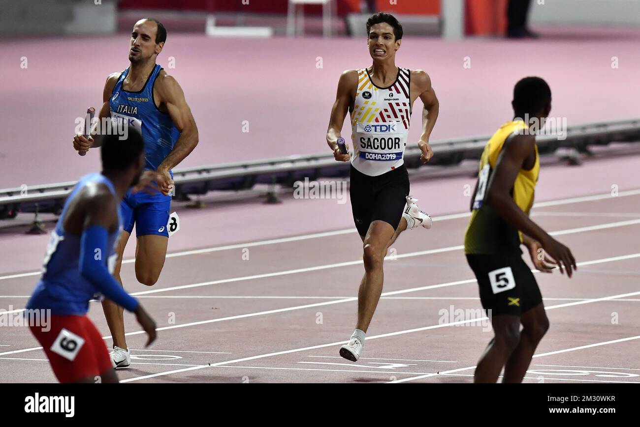 Belgian Jonathan Sacoor arrives with the relay baton during the final ...