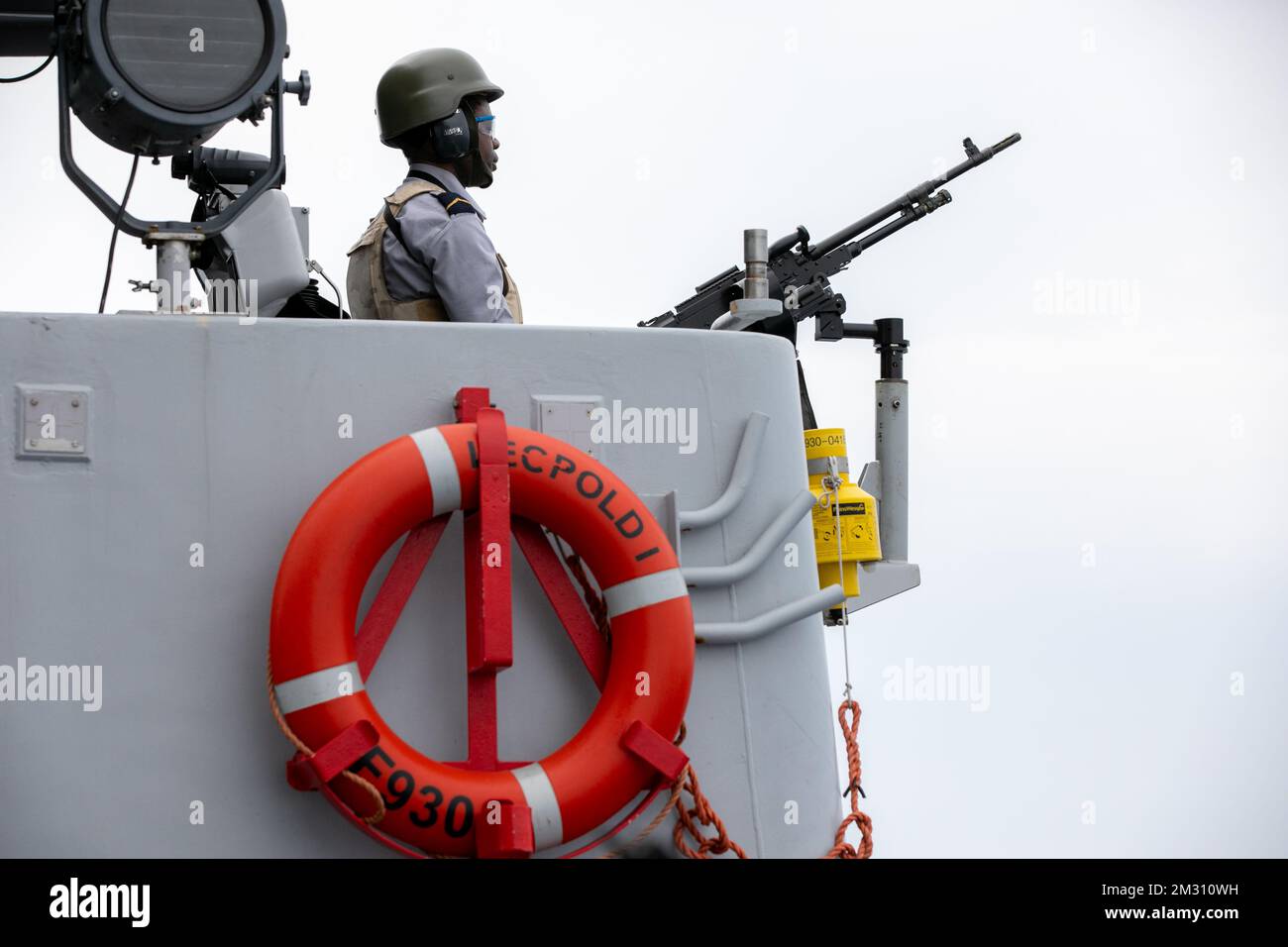 Military personnel pictured in action on the Leopold I frigate of ...