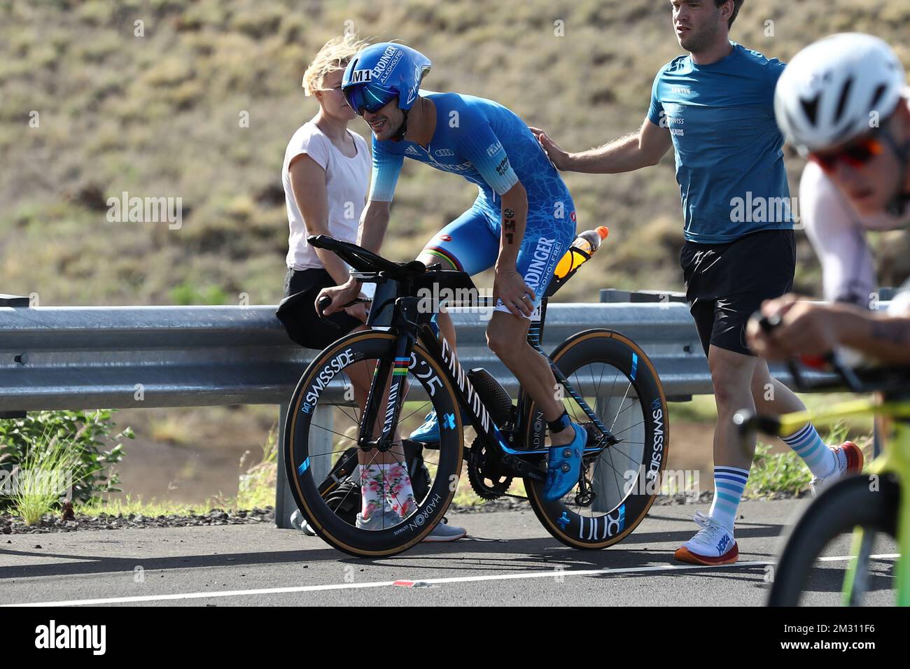 German Patrick Lange is injured during the Hawaii Ironman triathlon ...