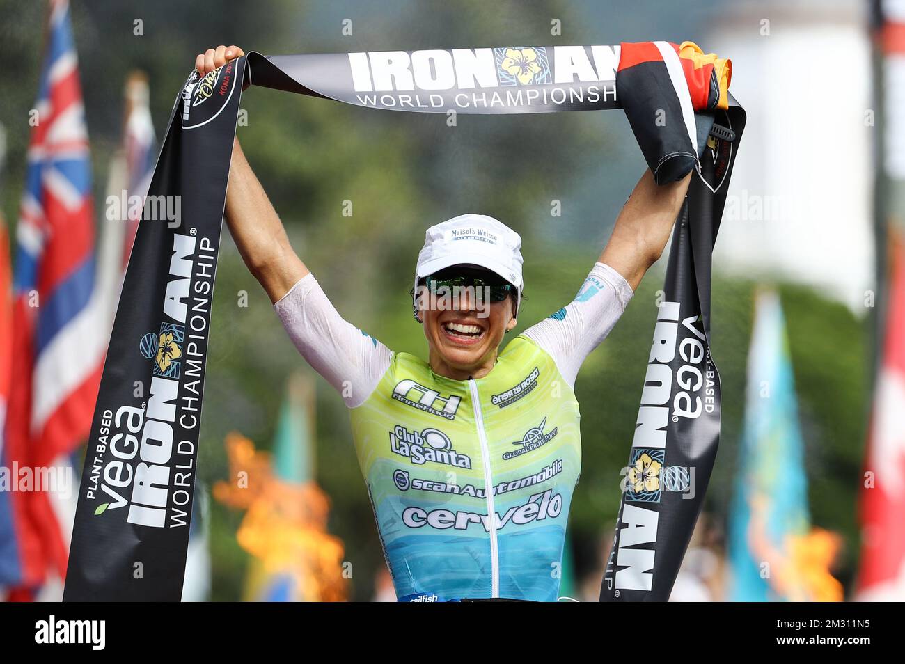 British Anna Haug crosses the finish line to win the Hawaii Ironman ...