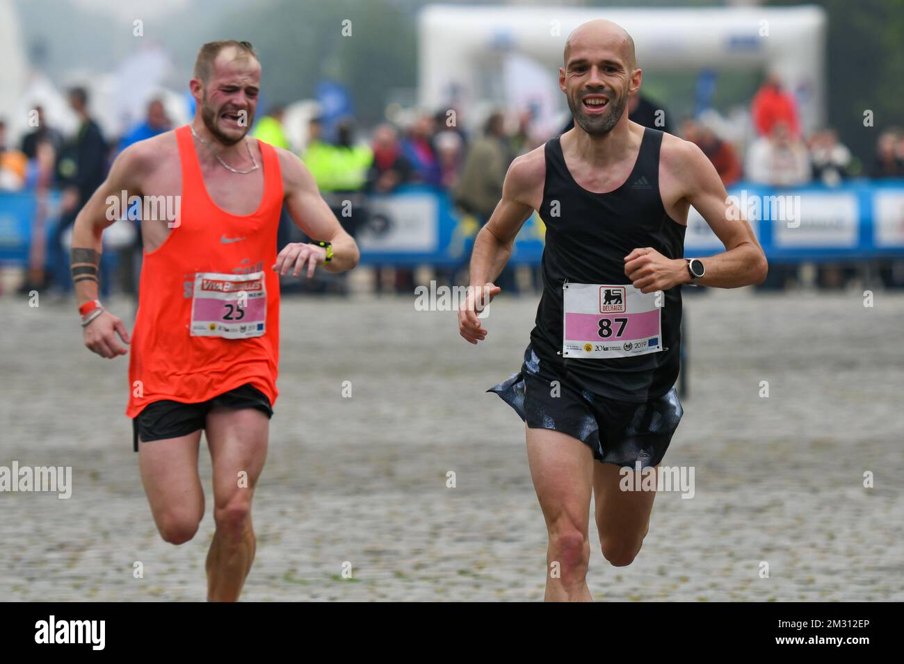 Runners at the finish line of the 40th edition of the Brussels 20km run ...