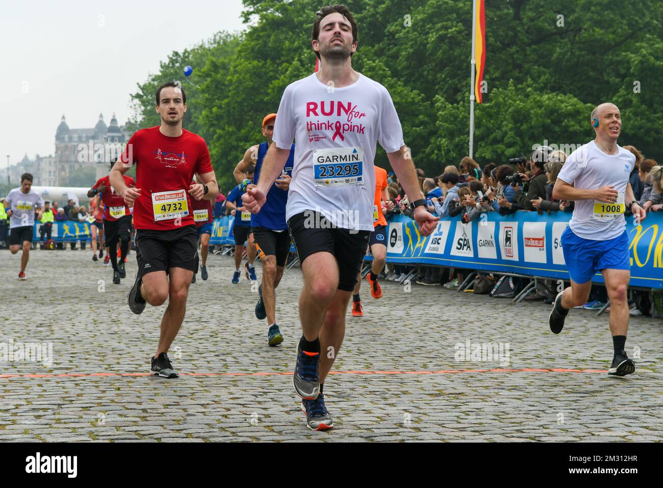 Runners at the finish line of the 40th edition of the Brussels 20km run ...