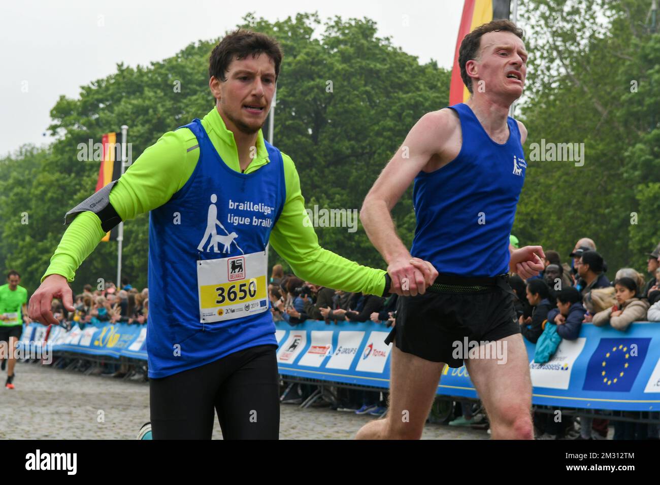 The Handisport competitors at the finish line of the 40th edition of ...