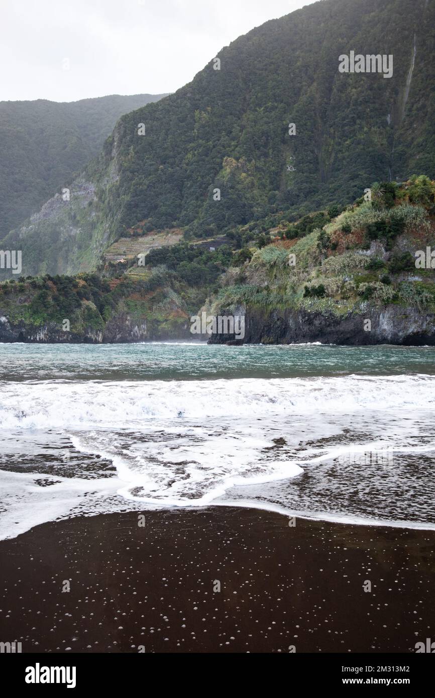 Seixal black sand beach in Madeira Stock Photo - Alamy