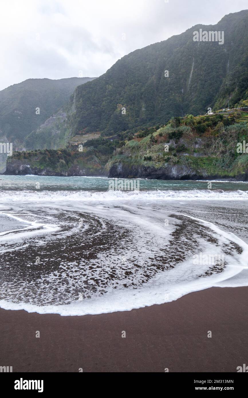 Seixal black sand beach in Madeira Stock Photo - Alamy