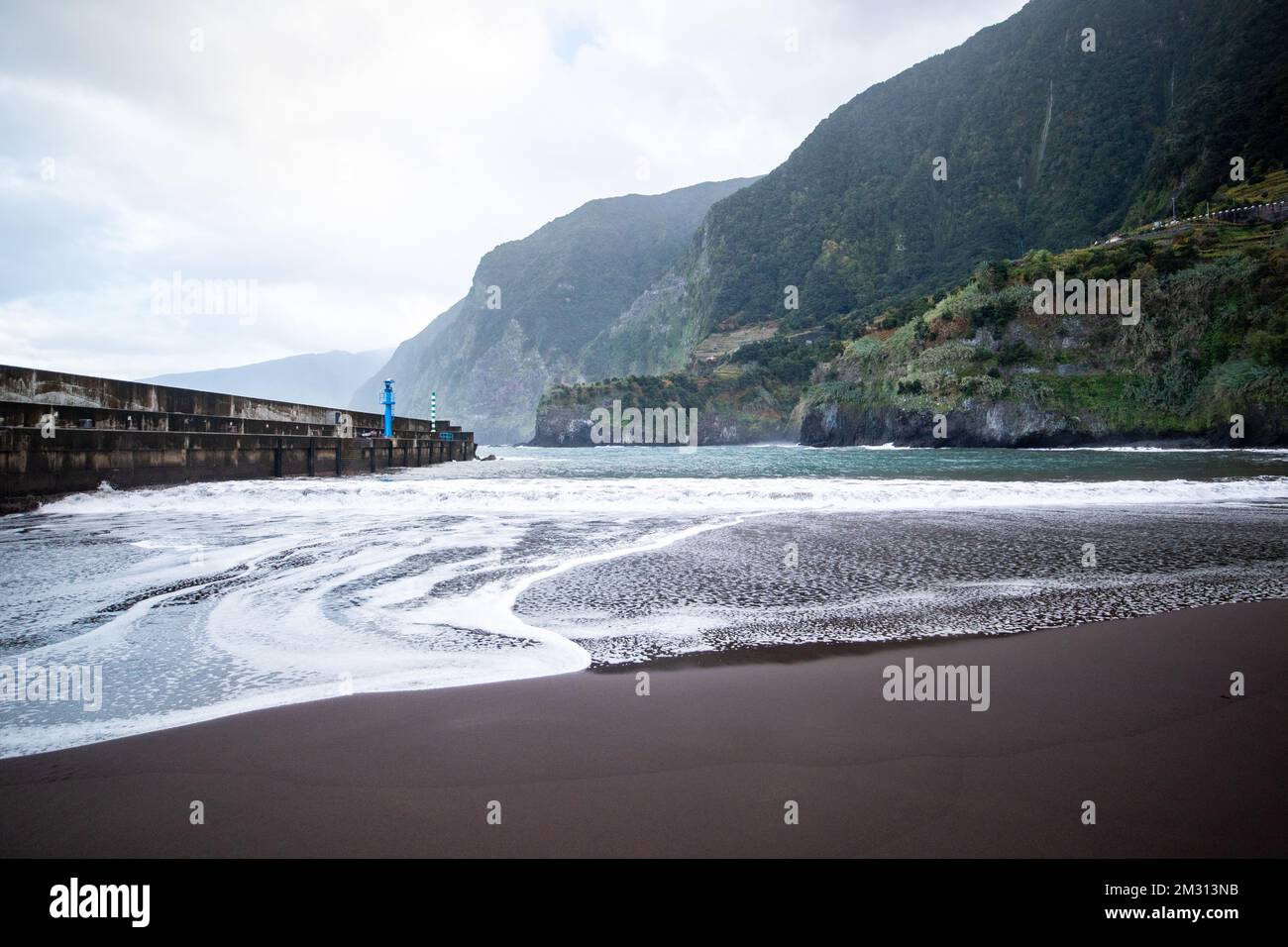 Seixal black sand beach in Madeira Stock Photo - Alamy