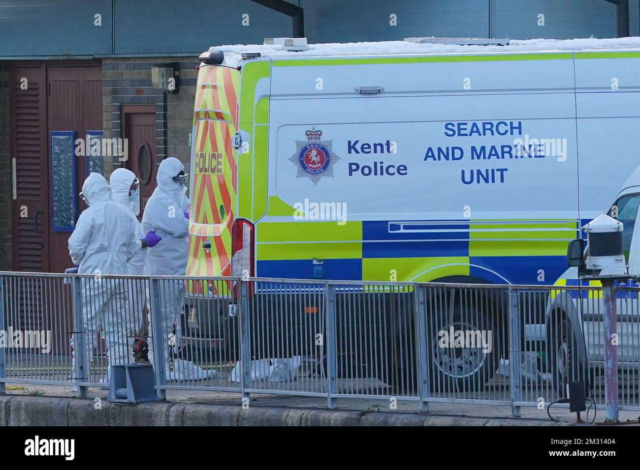 Police Forensic officers at the RNLI station at the Port of Dover after ...
