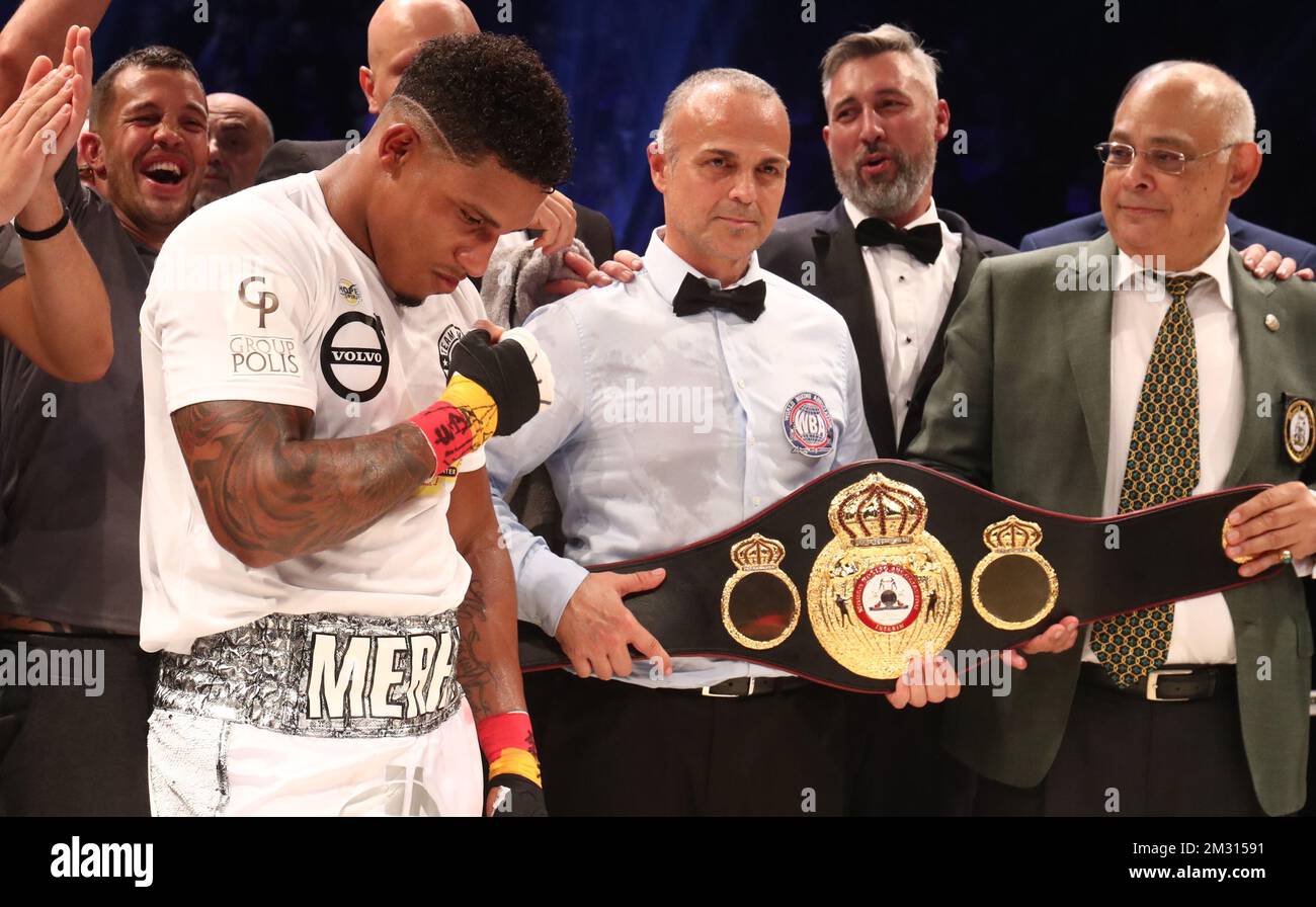 Belgian Ryad Merhy celebrates after winning a boxing fight between ...