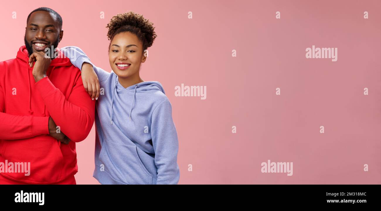 Romantic couple best friends standing pink background girl leaning ...