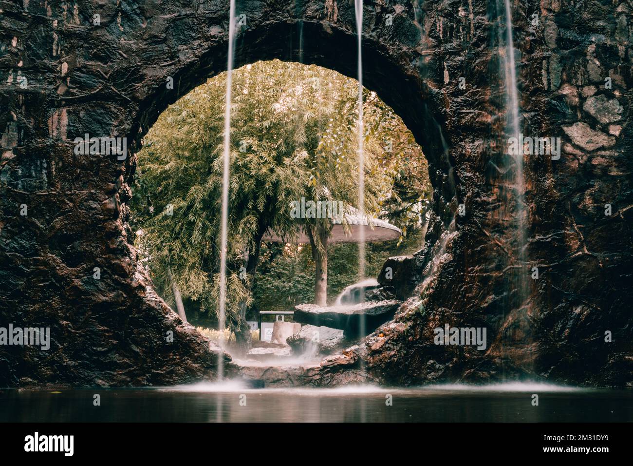 A circle on the wall in front of the water Stock Photo - Alamy