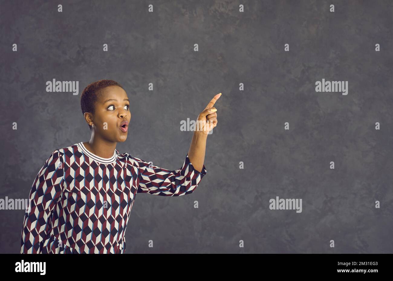 African american woman in casual clothes with surprised facial ...