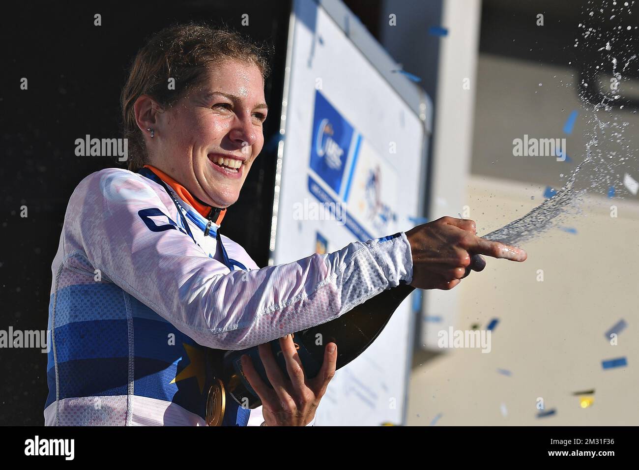 Dutch Yara Kastelijn celebrates on the podium with champagne after ...